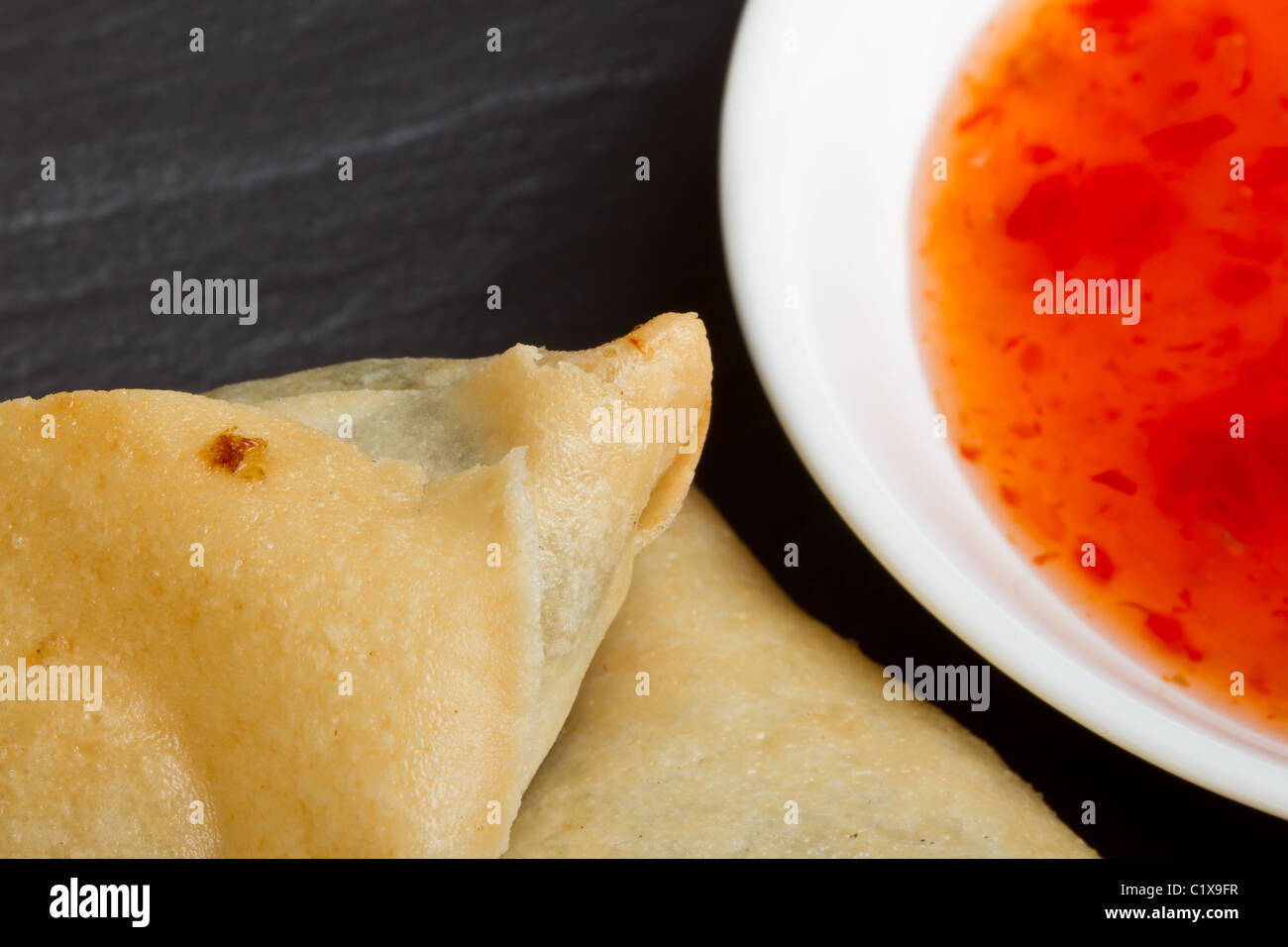 Deep fried chicken samosas hi-res stock photography and images - Alamy