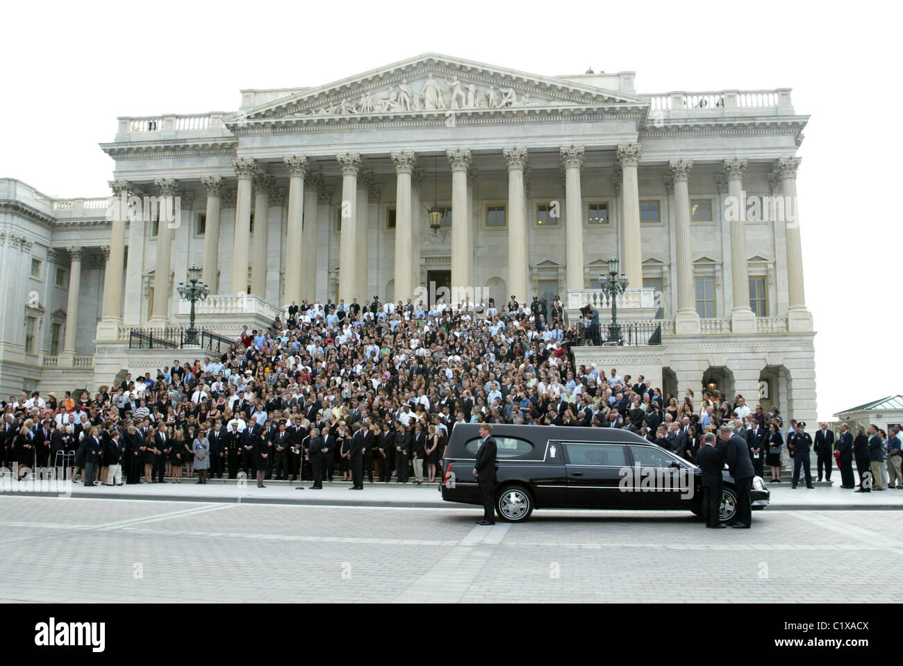 The hearse The family of the late Senator Ted Kennedy drive past the ...