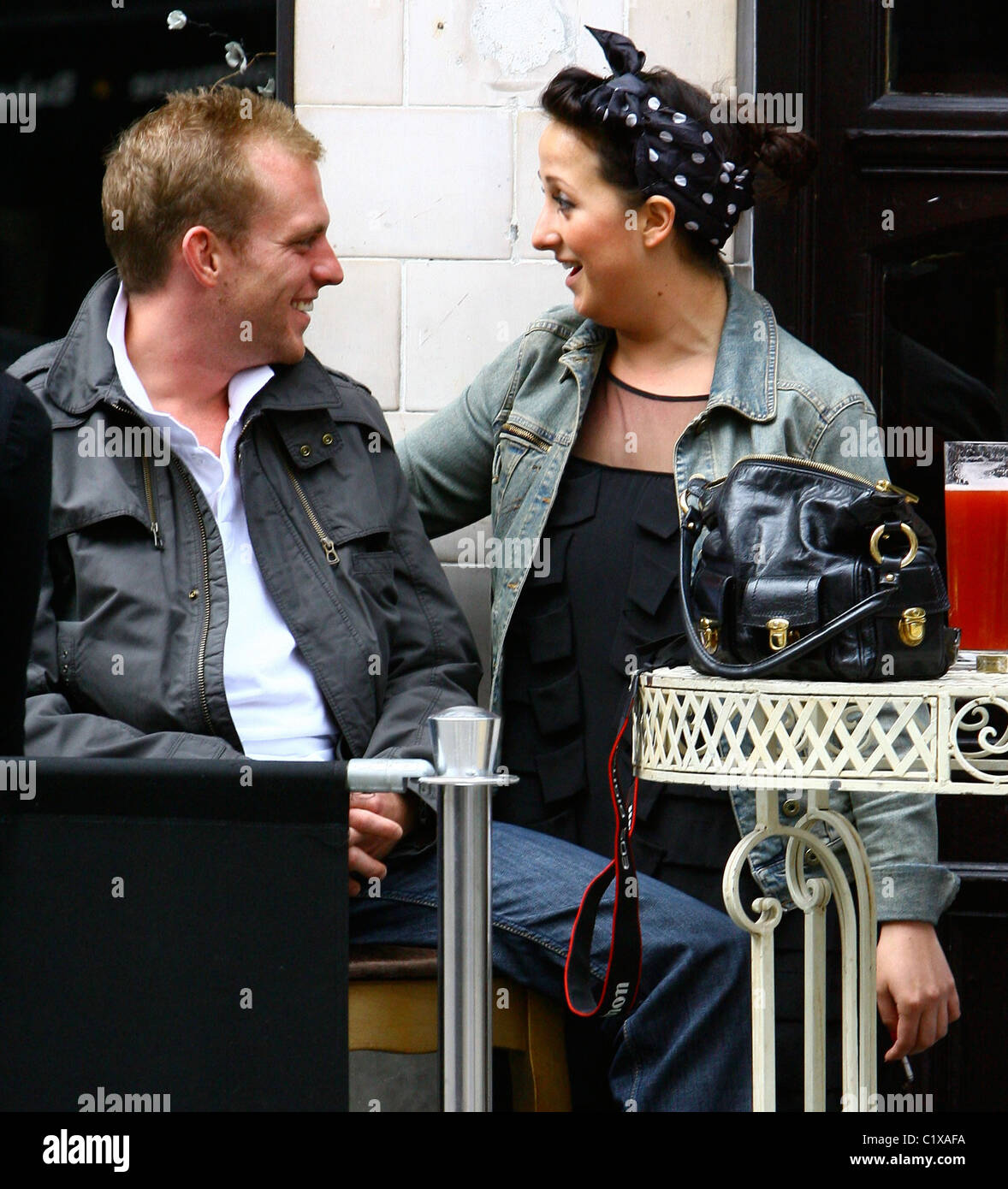 Natalie Cassidy and boyfriend Ben Porter stop at a bar for some drinks. London, England - 30.08. ...