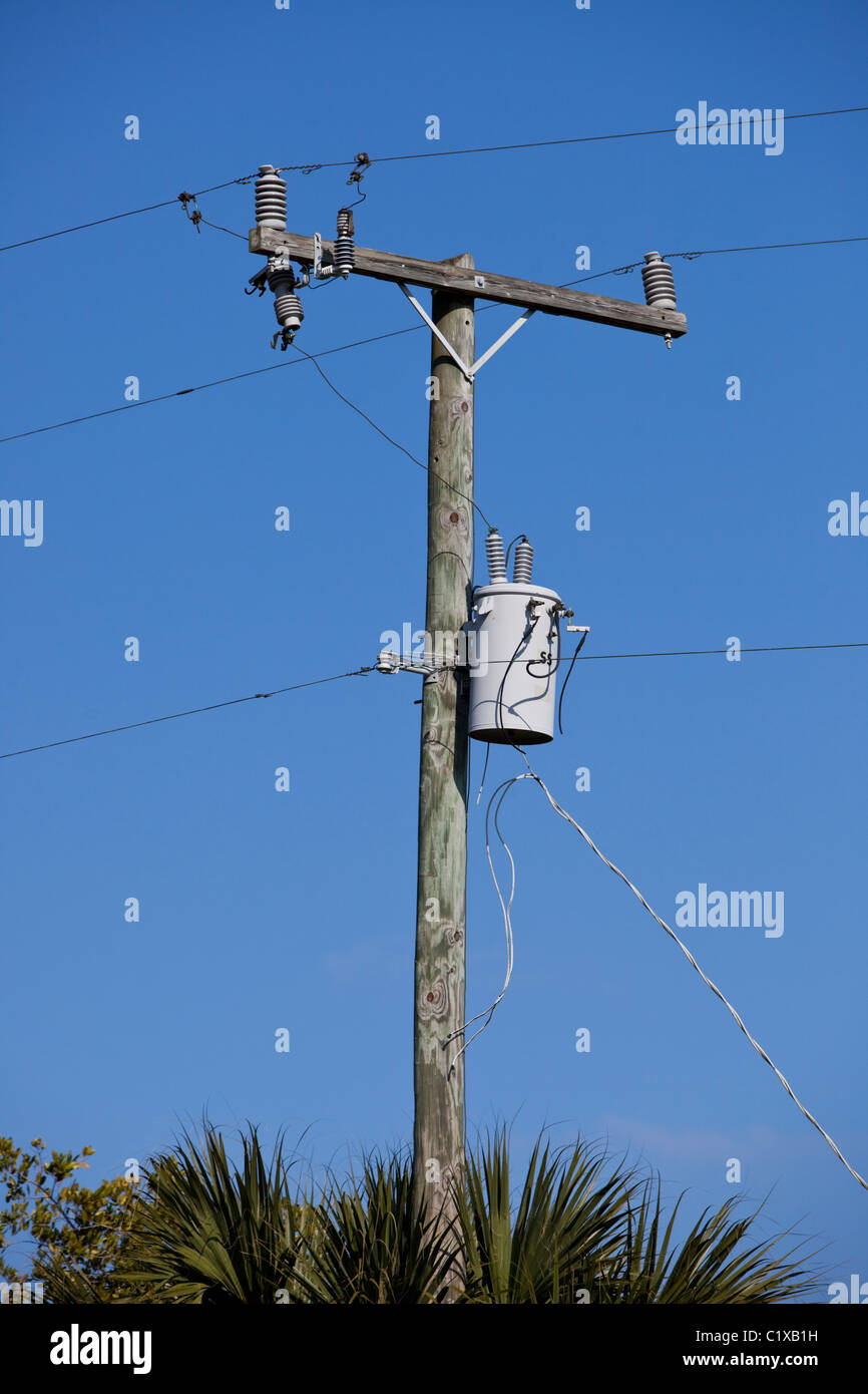 A utility post with a distribution transformer on it Stock Photo - Alamy