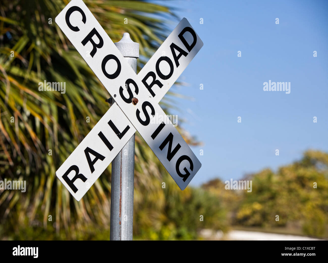 Railroad crossing sign concept, Florida, USA Stock Photo - Alamy