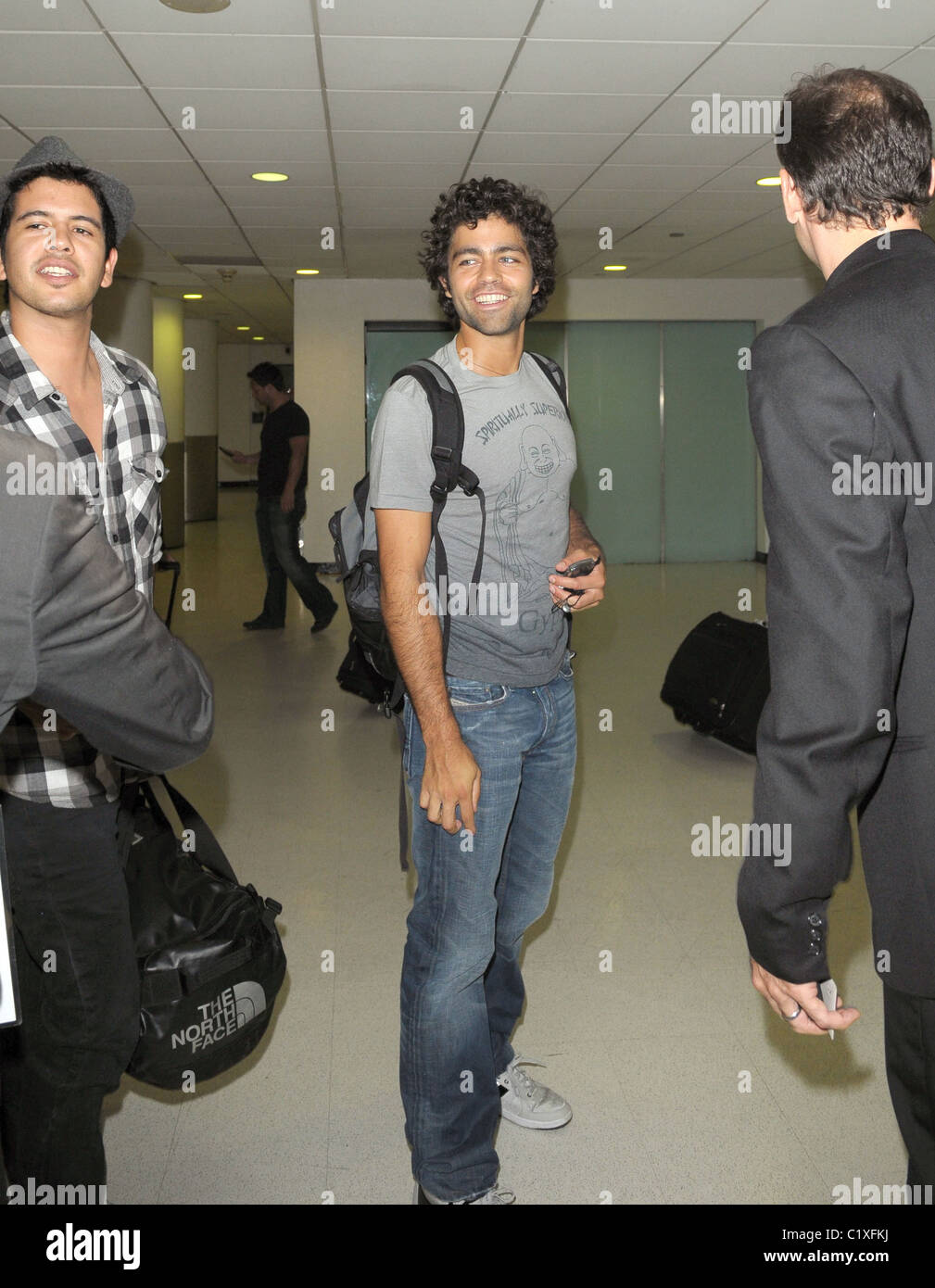 Adrian Grenier arrives at Miami international Airport Miami, Florida ...
