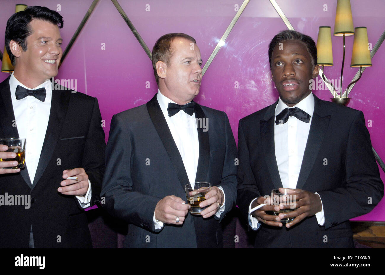 Sam Kane as Dean Martin, Louis Hoover as Frank Sinatra and Giles Terera ...