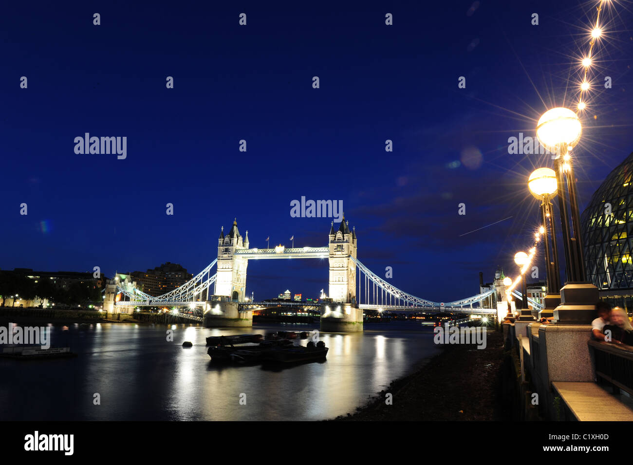 Tower Bridge and reflection of Tower Bridge in river Thames in London ...