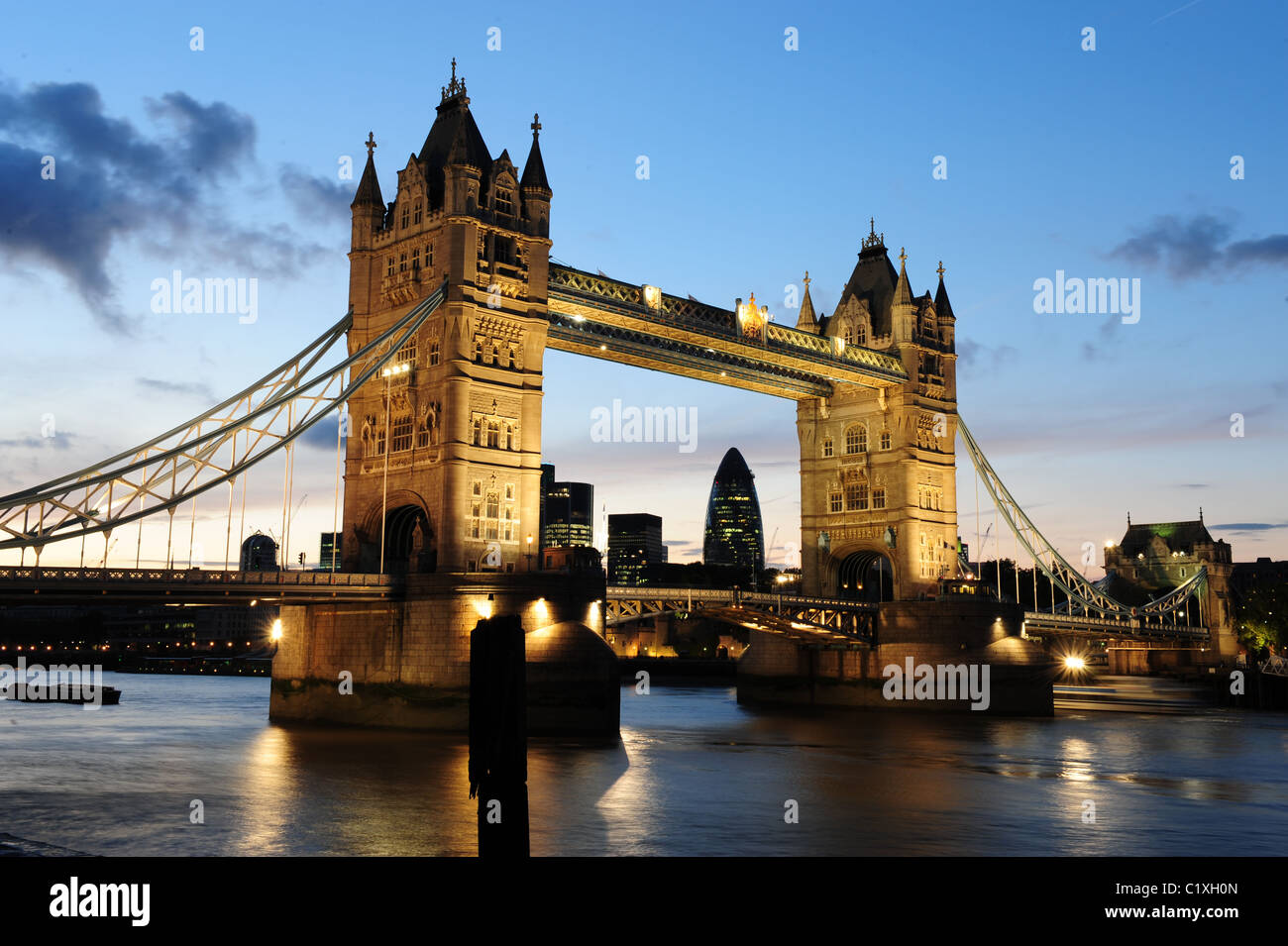 Tower Bridge and reflection of Tower Bridge in river Thames in London ...