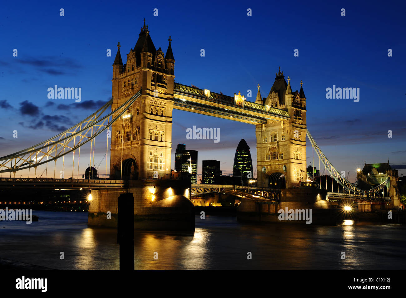 Tower Bridge and reflection of Tower Bridge in river Thames in London ...