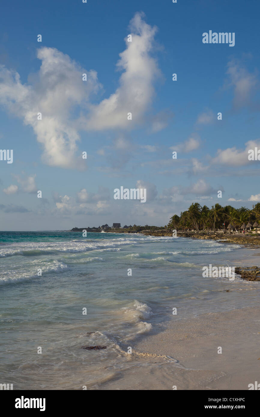 Waves wash against El Paraiso beach at sunrise in Tulum, Quintana Roo ...