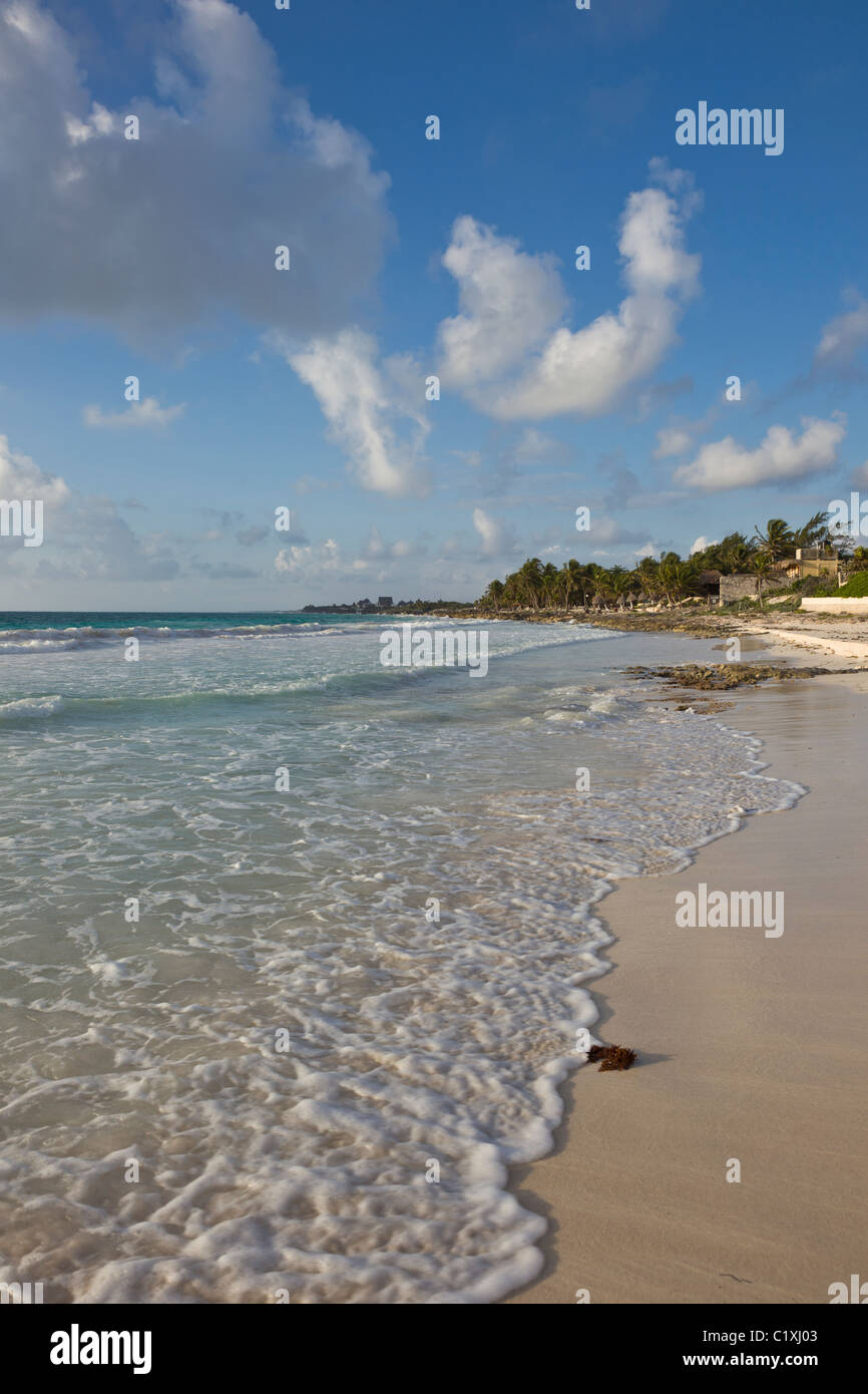 Waves wash against El Paraiso beach at sunrise in Tulum, Quintana Roo ...