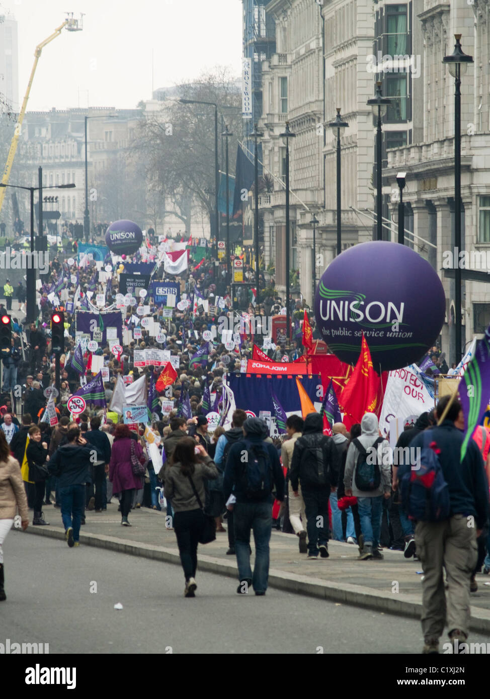Protesters march down Piccadilly in London during the TUC organised ...