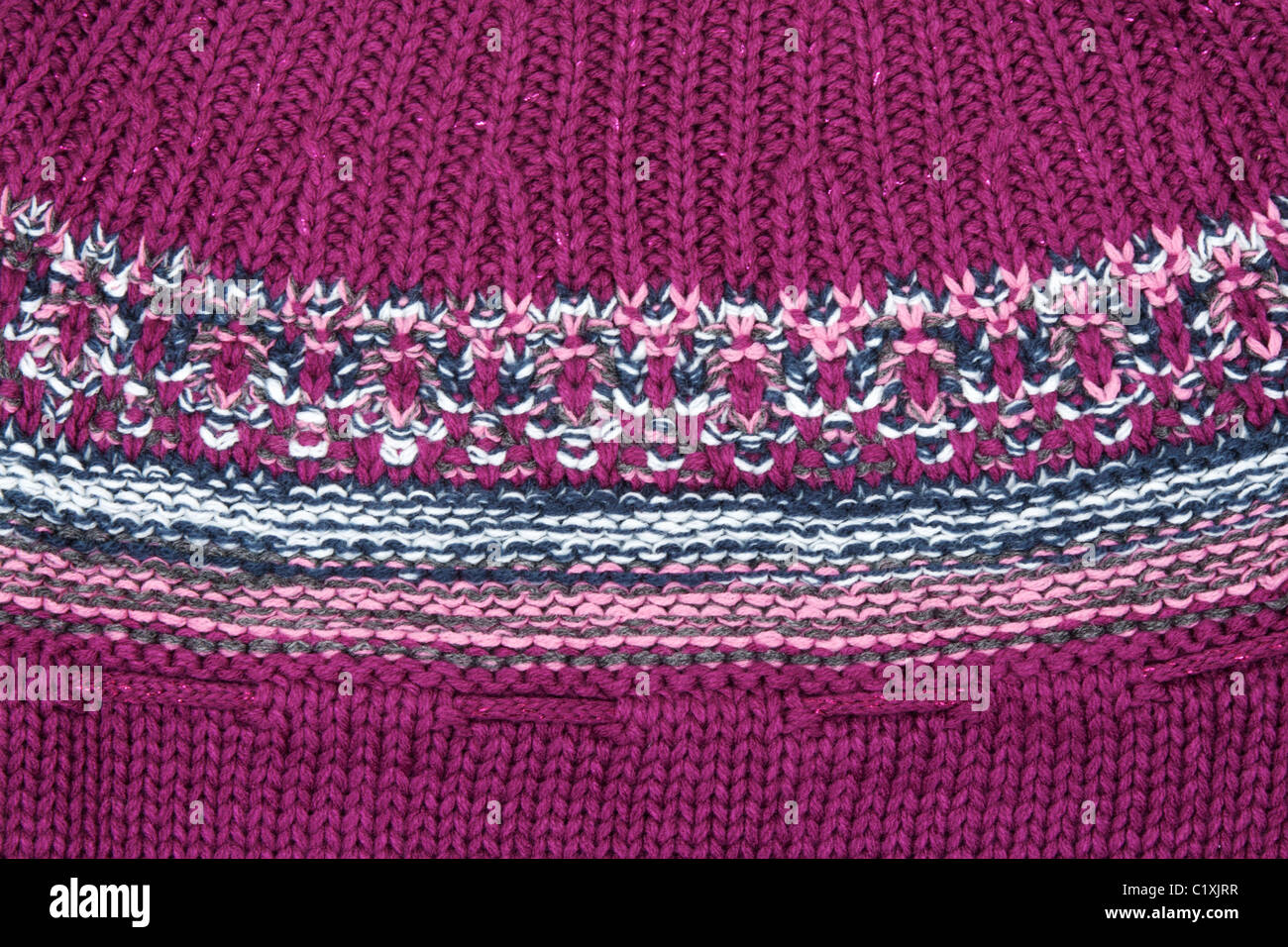 Background from knitted violet fabrics with pattern Stock Photo - Alamy