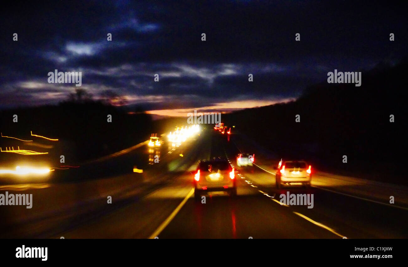 Evening highway driving on vacation. Car driving fast Stock Photo - Alamy
