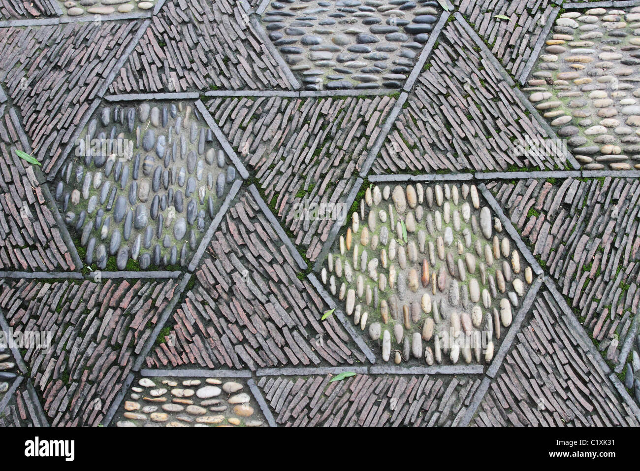 Rock sidewalk pattern. YuYuan Garden, Old Town area of Shanghai, China ...