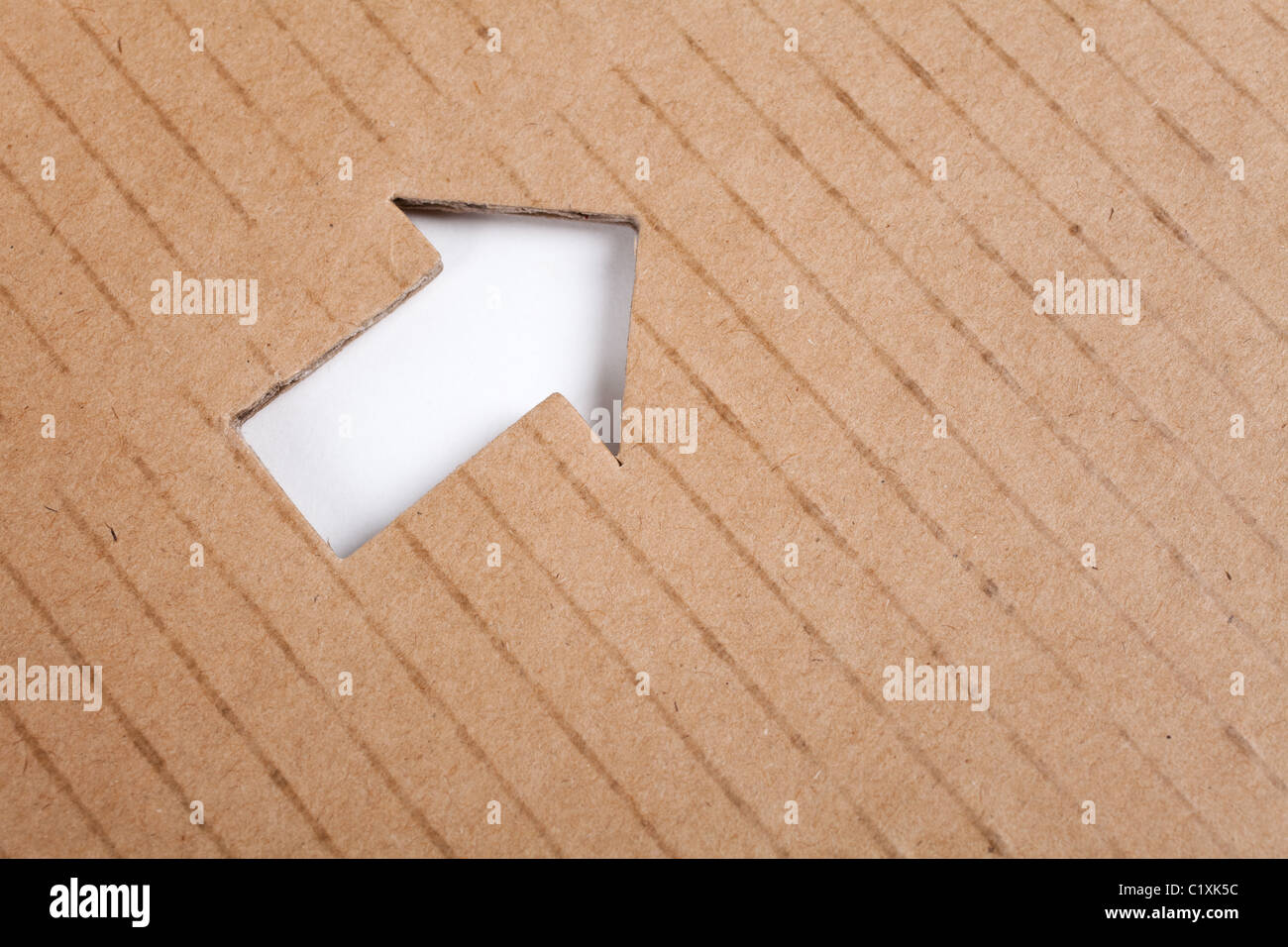 Arrow Sign and cardboard for background Stock Photo - Alamy