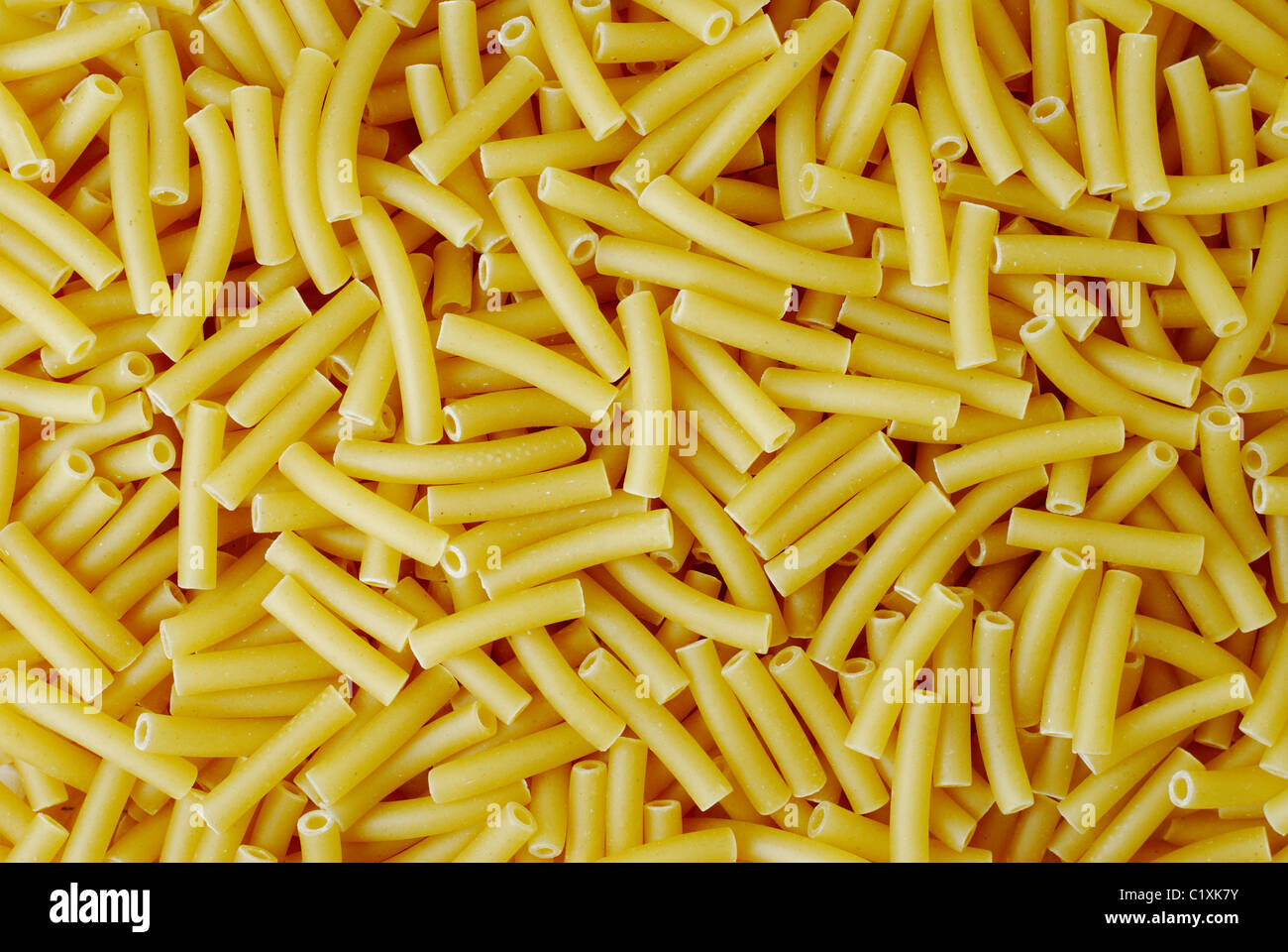 Dried Italian pasta background Stock Photo - Alamy
