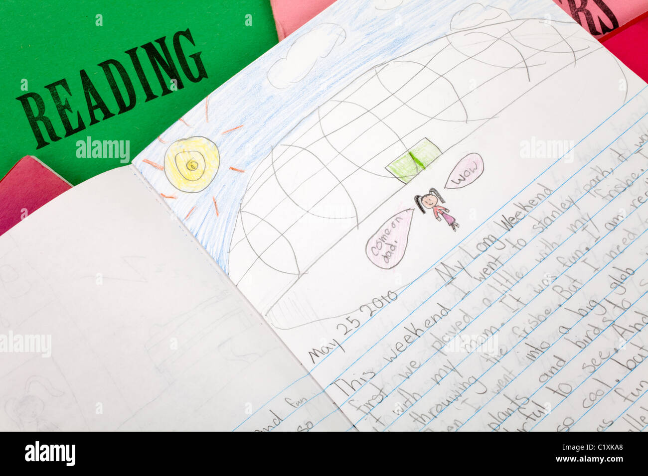 Children reading and writing hi-res stock photography and images - Alamy