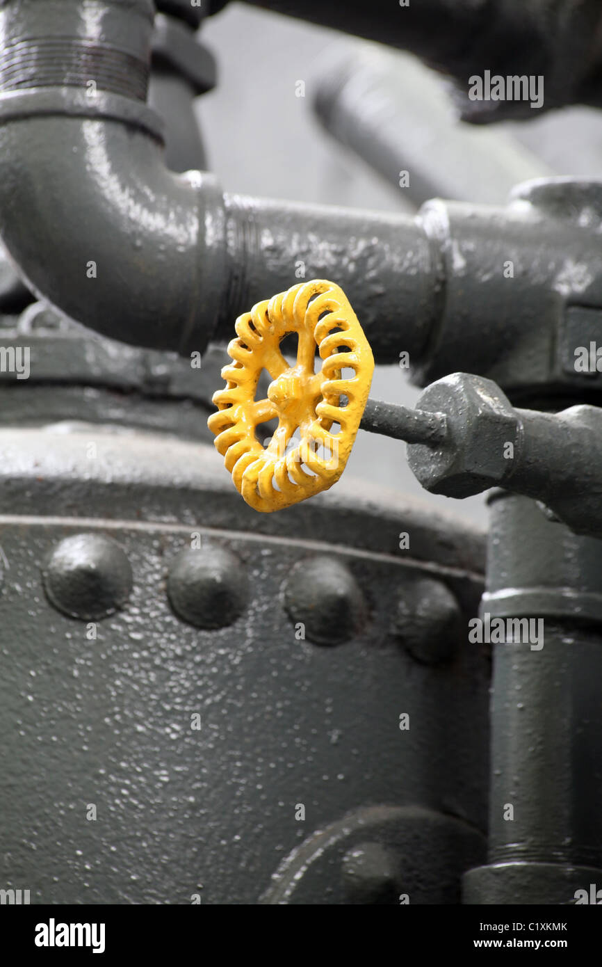 yellow Pipeline valve close up Stock Photo - Alamy