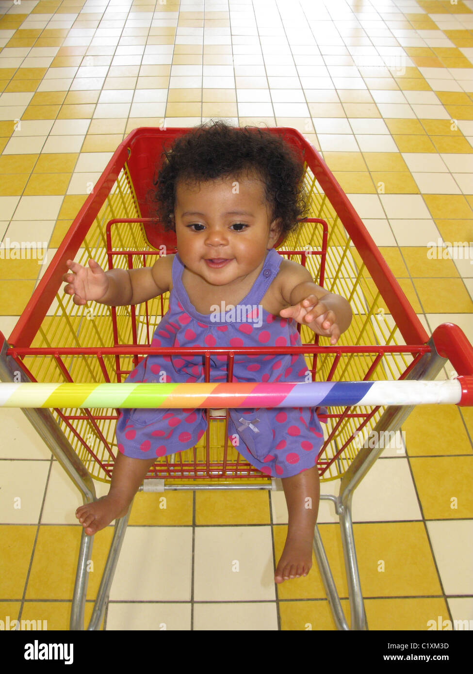 Sitting in push cart hi-res stock photography and images - Alamy