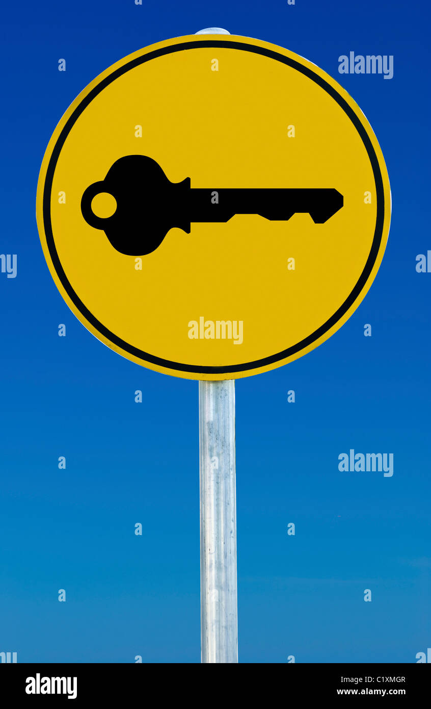 A key sign isolated on a blue graduated sky Stock Photo - Alamy