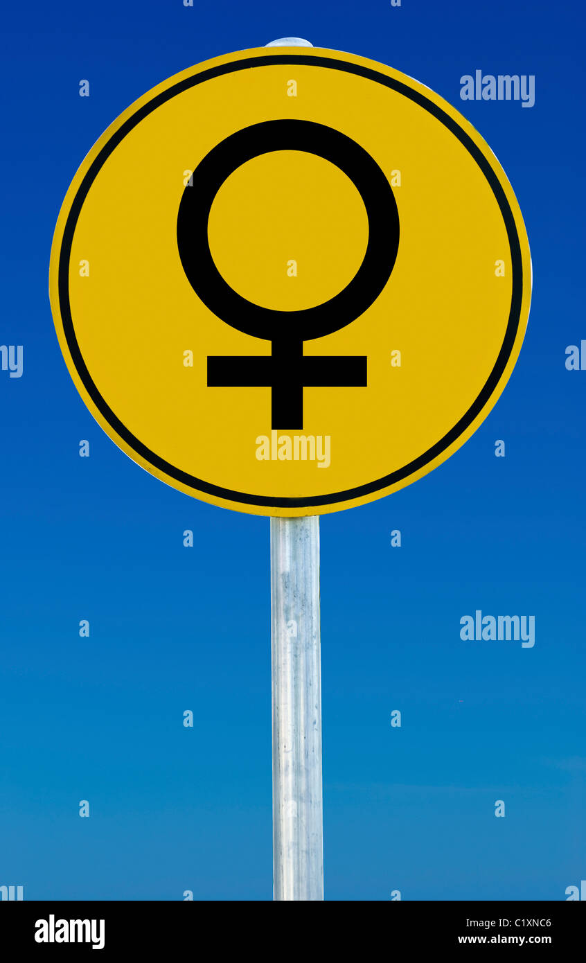 A female gender sign isolated on a blue graduated sky Stock Photo - Alamy