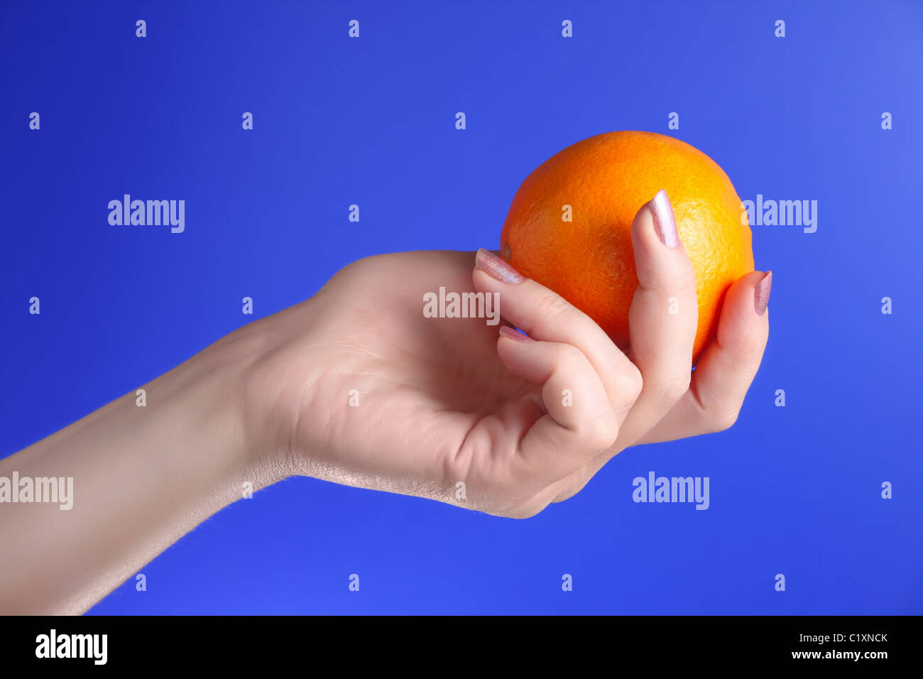 Woman holds left palm hi-res stock photography and images - Alamy