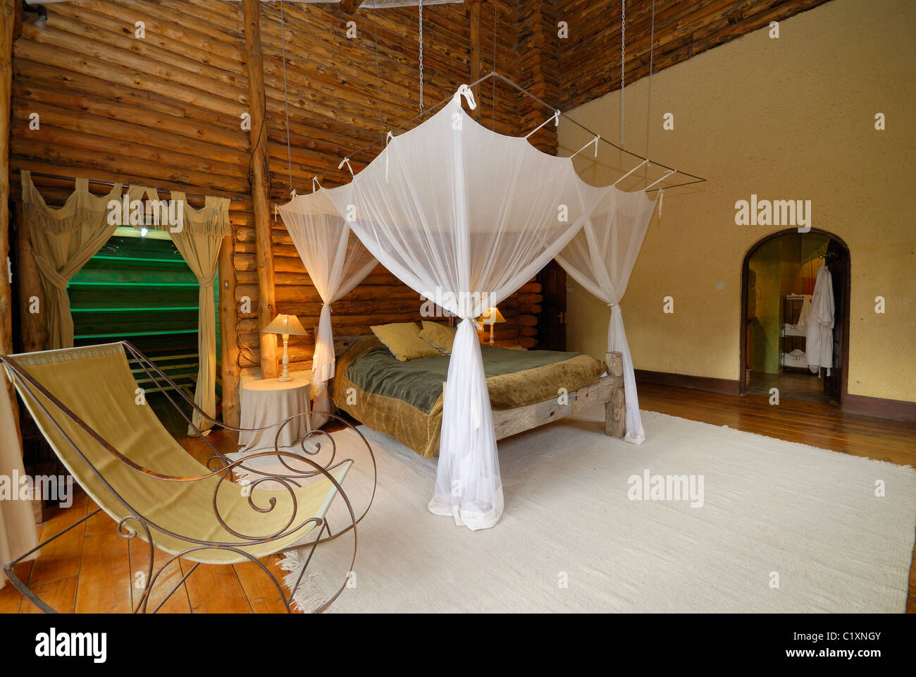 sleeping room of log cabin in Ngong House Safari Hotel, Nairobi, Kenya ...