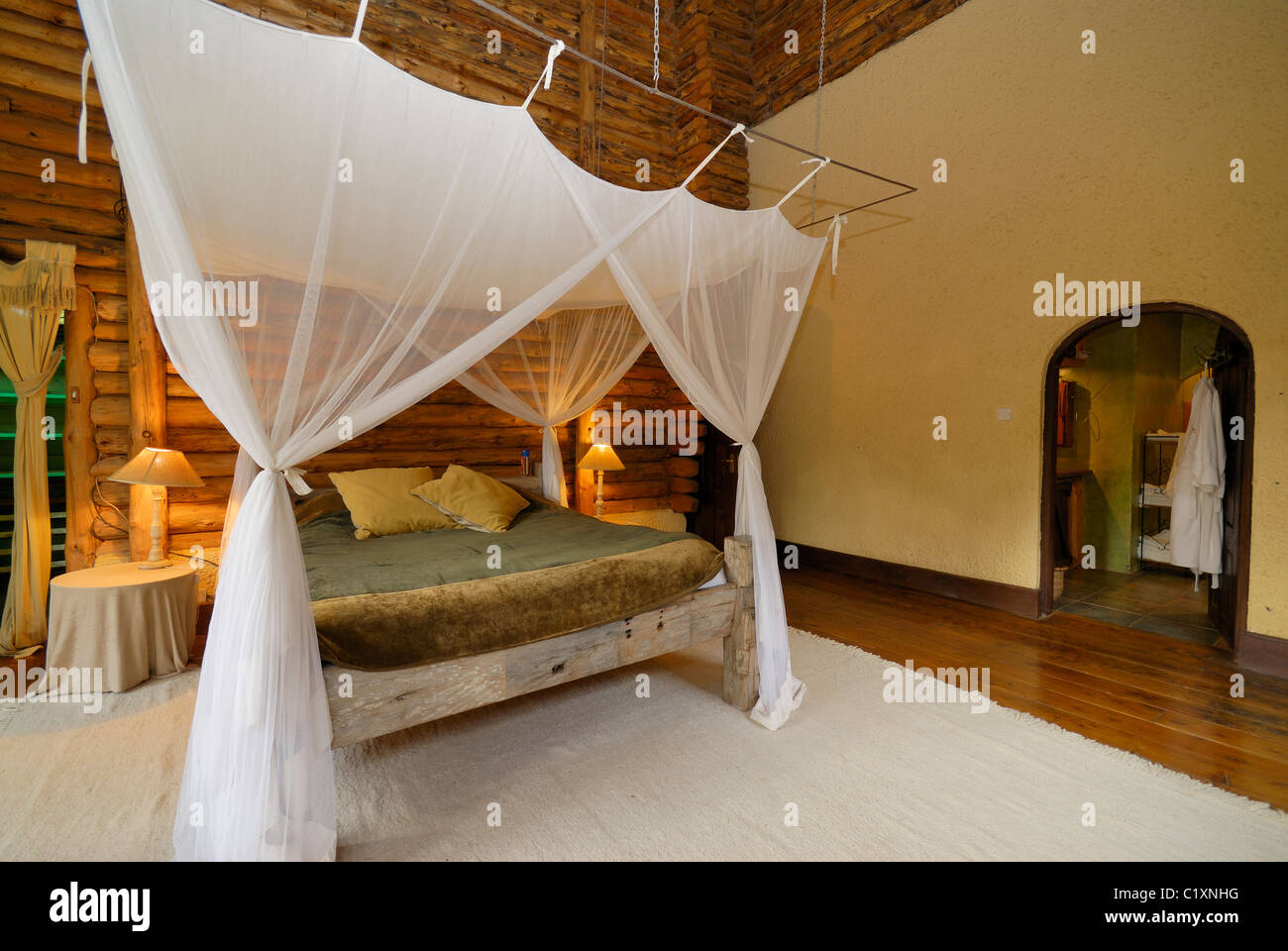 sleeping room of log cabin in Ngong House Safari Hotel, Nairobi, Kenya ...