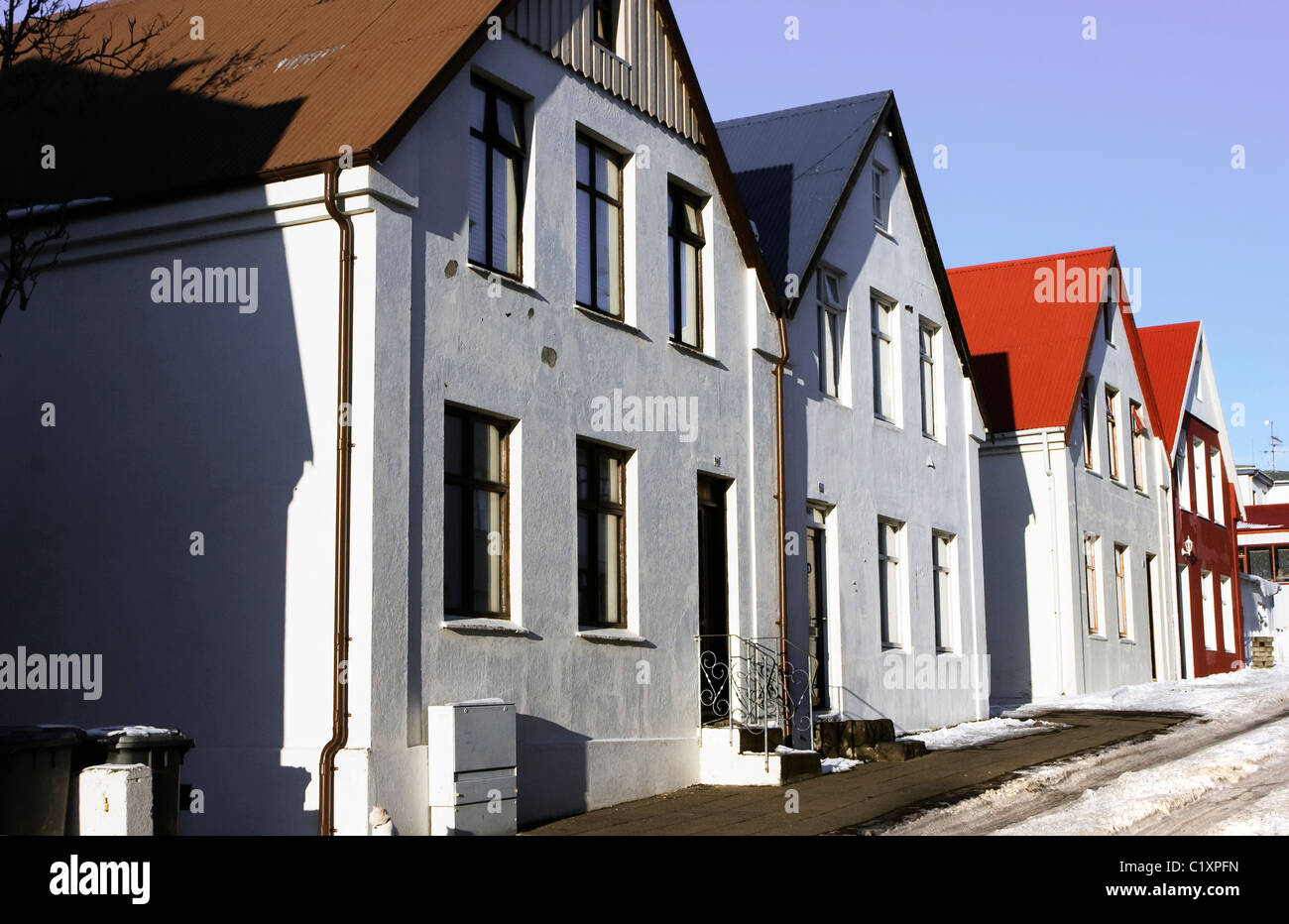 A row of buildings on an icy street in Reykjavik, Iceland Stock Photo ...
