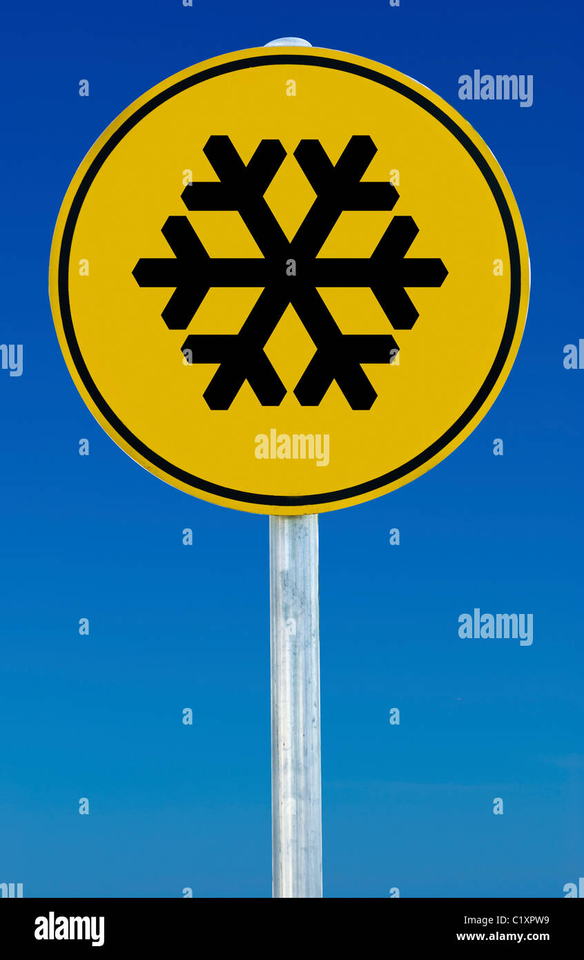 A snow sign isolated on a blue graduated sky Stock Photo - Alamy