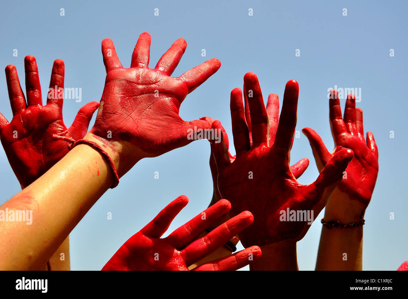 Coloured hands hi-res stock photography and images - Alamy