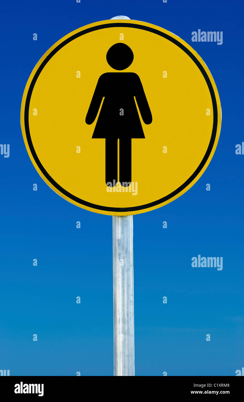 A female sign isolated on a blue graduated sky Stock Photo - Alamy