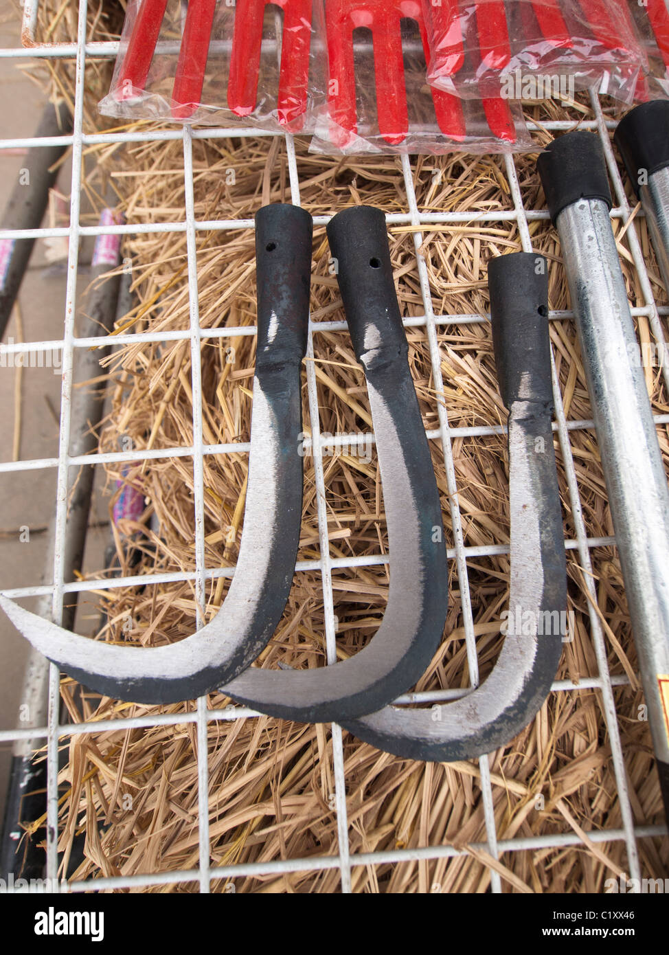 A scythe for farming Stock Photo - Alamy