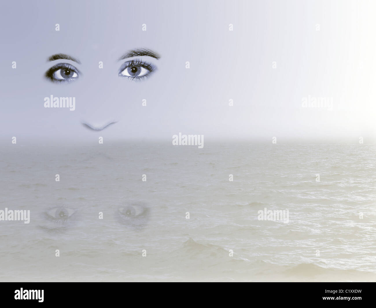 Reflection of eyes in the sea quiet Stock Photo - Alamy