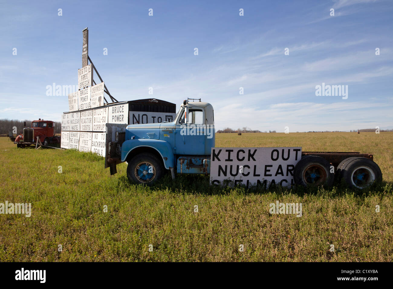 Anti nuclear power plant protest billboards in rural field, Peace River ...