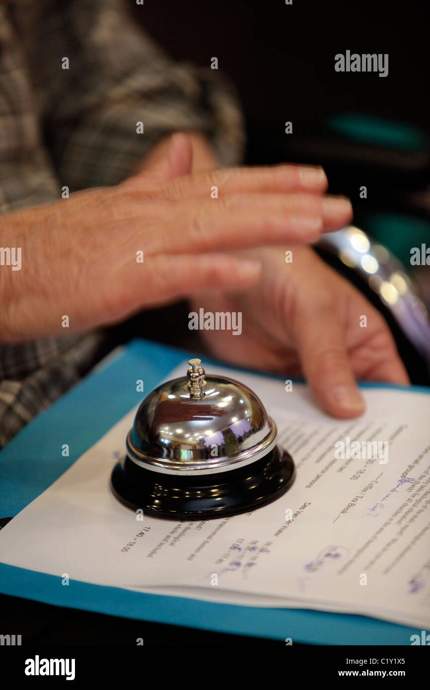 A bell used to time speakers at a conference Stock Photo - Alamy