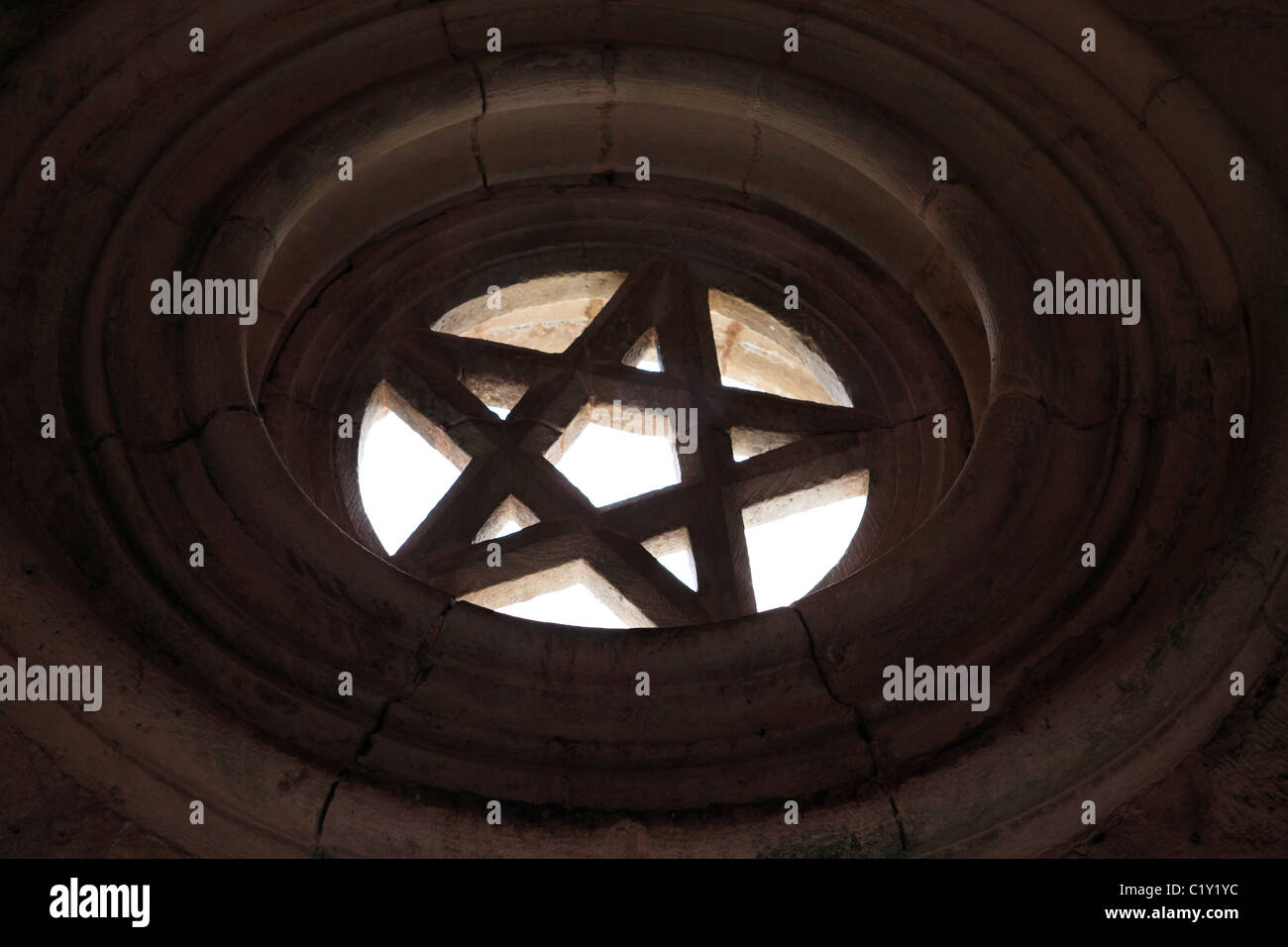 A pentagram is carved into a window at Alcobaca Monastery in Portugal ...