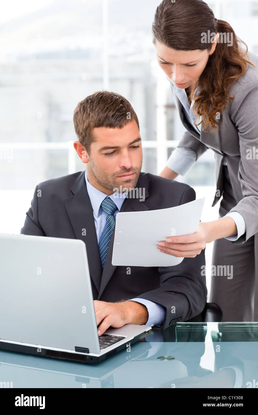 Two workers reading online hi-res stock photography and images - Alamy