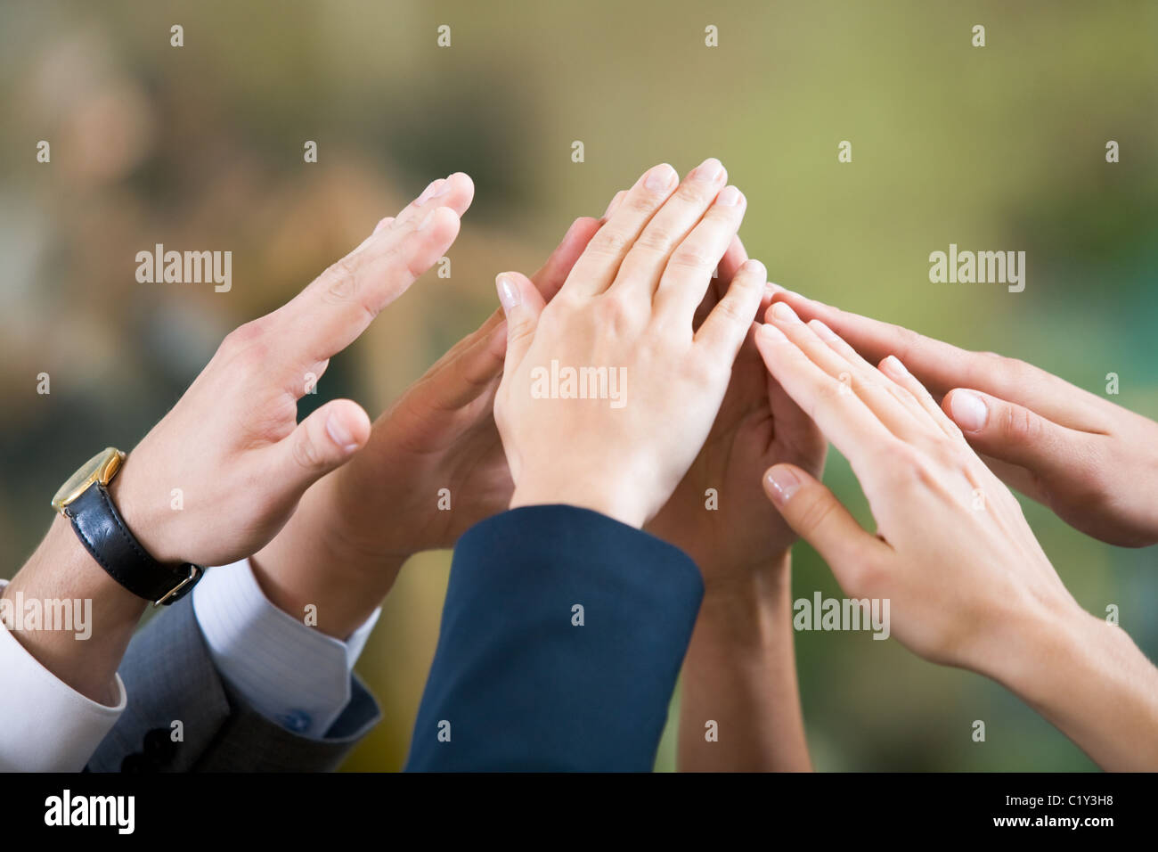 Several raising human hands hi-res stock photography and images - Alamy