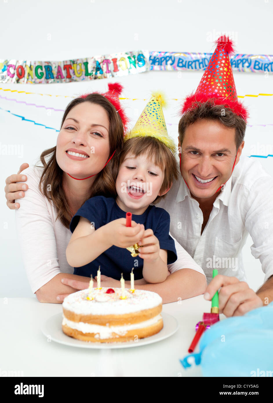 Portrait of a parents celebrating little their son Stock Photo - Alamy