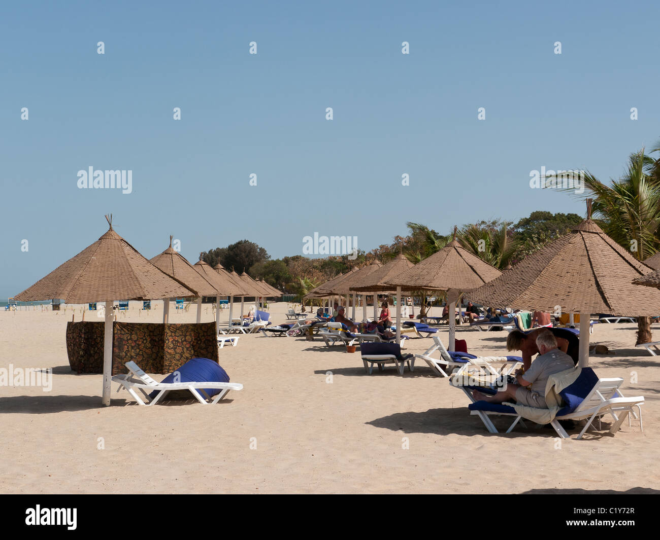 The beach with sunbeds and thatched parasols by the Atlantic Hotel ...