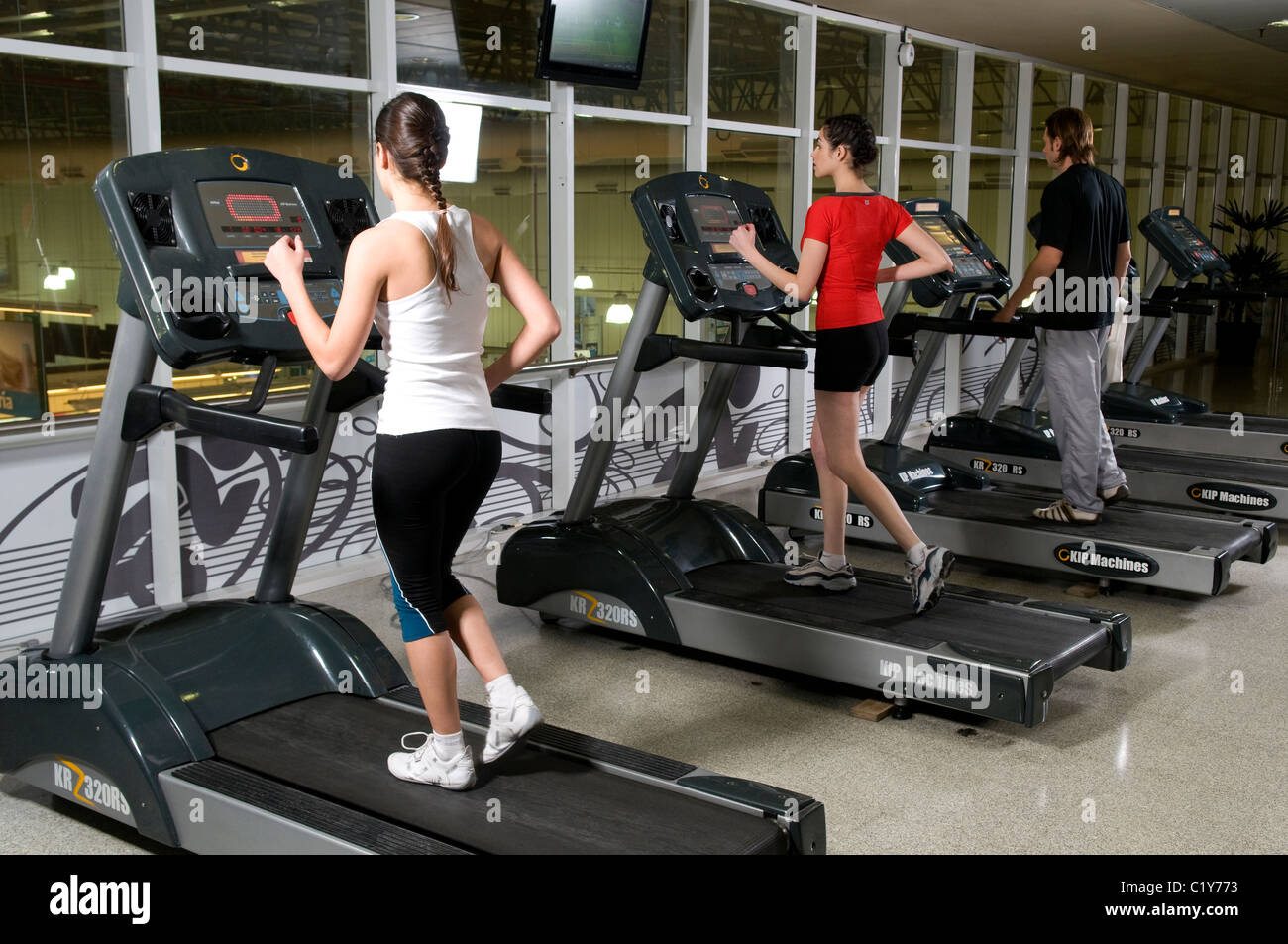 Image, a, lady, facing, backwards, with, personal, trainer, coach, help ...