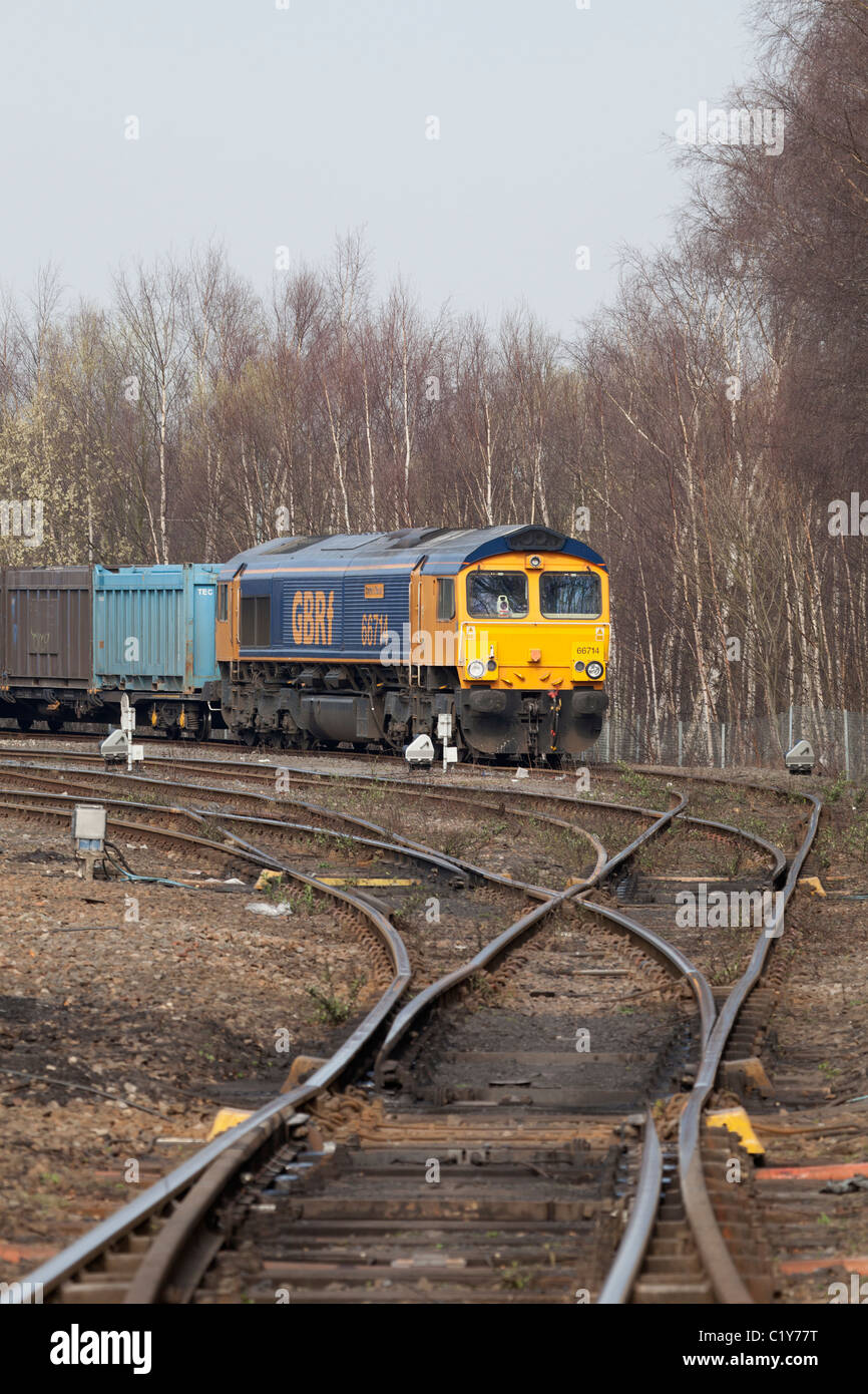 Class 66 66714 'Cromer Lifeboat' on a freight train at Decoy sidings ...