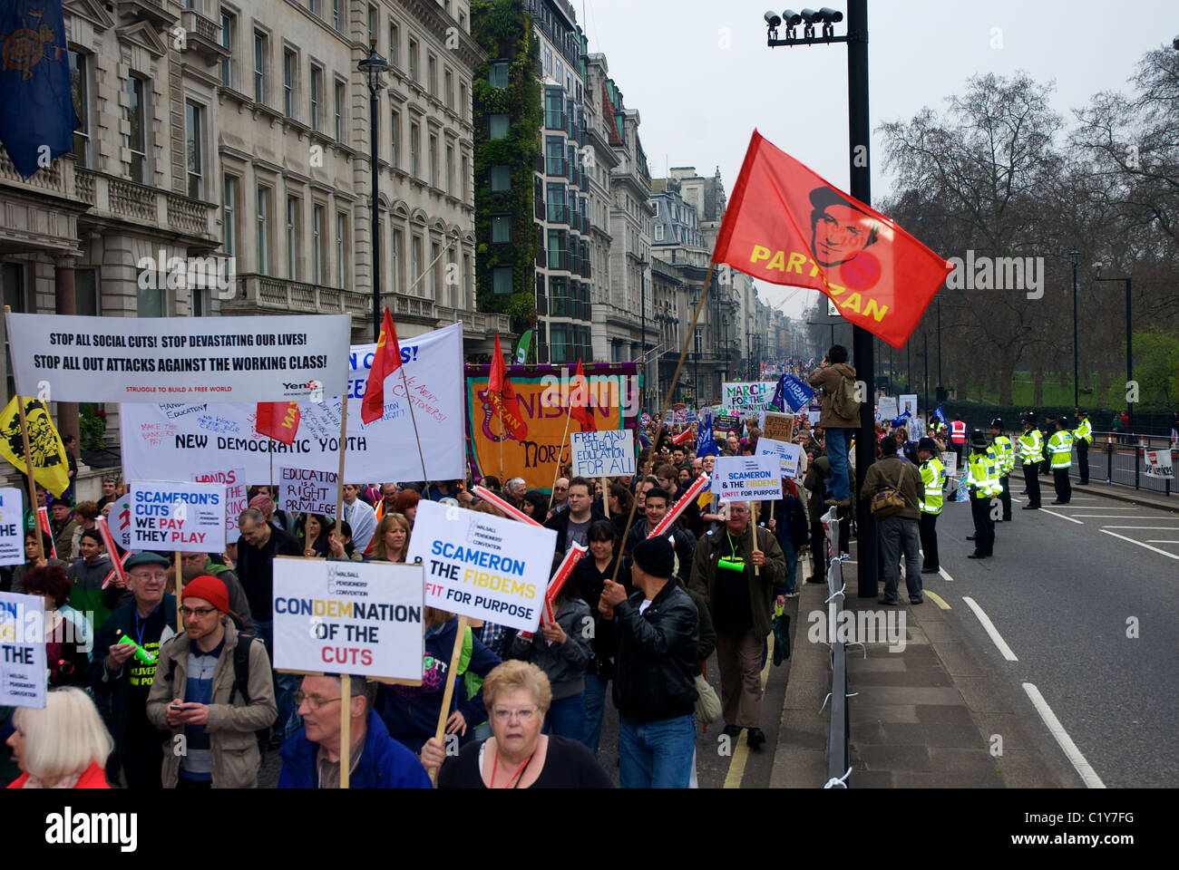 Protesters marching along Piccadilly at March for the Alternative rally ...