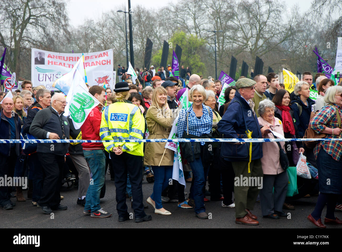 Friendly crowd of marcher pass a police woman at March for the ...