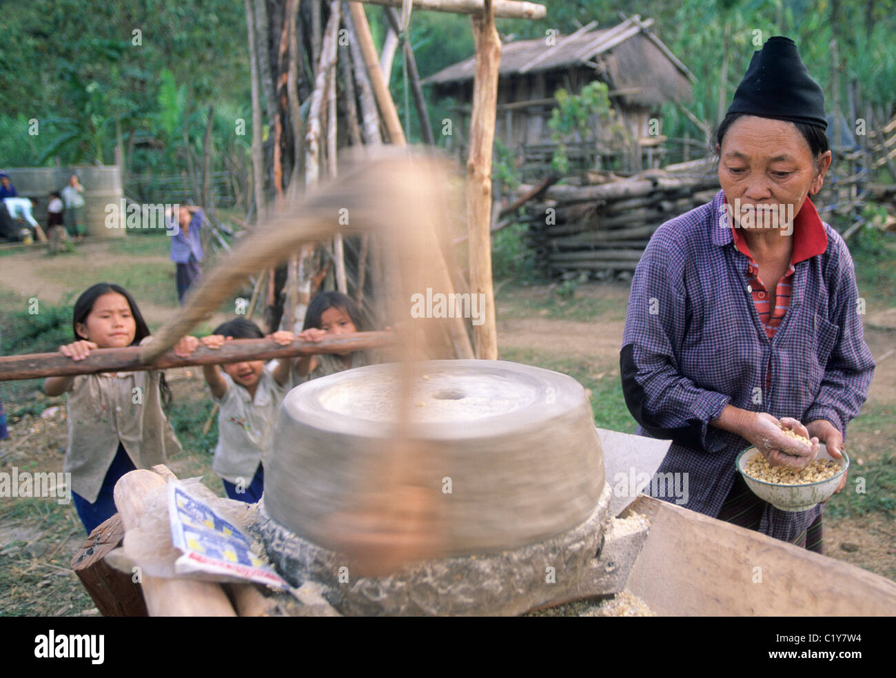 Elk132-2134 Laos, Luang Prabang, Hmong village, mother and children ...
