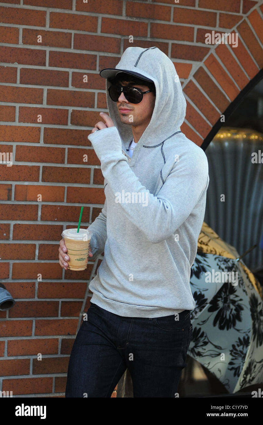 Joe Jonas of the Jonas brothers seen out with a coffee in Yorkville ...