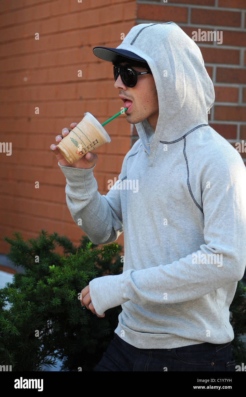 Joe Jonas of the Jonas brothers seen out with a coffee in Yorkville ...