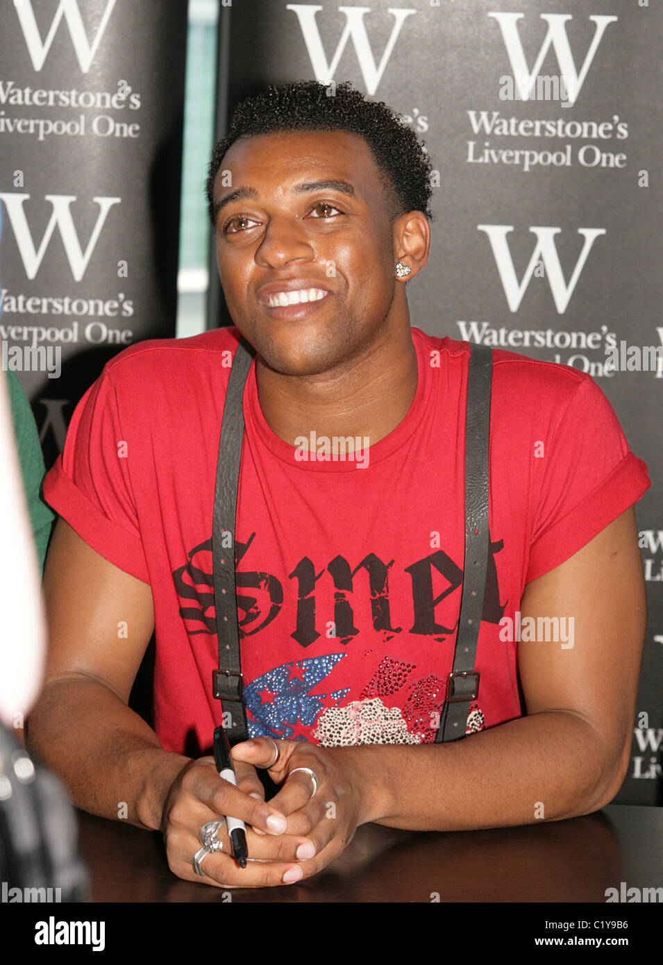 Oritse Williams JLS signing copies of their new book 'JLS - Our Story ...