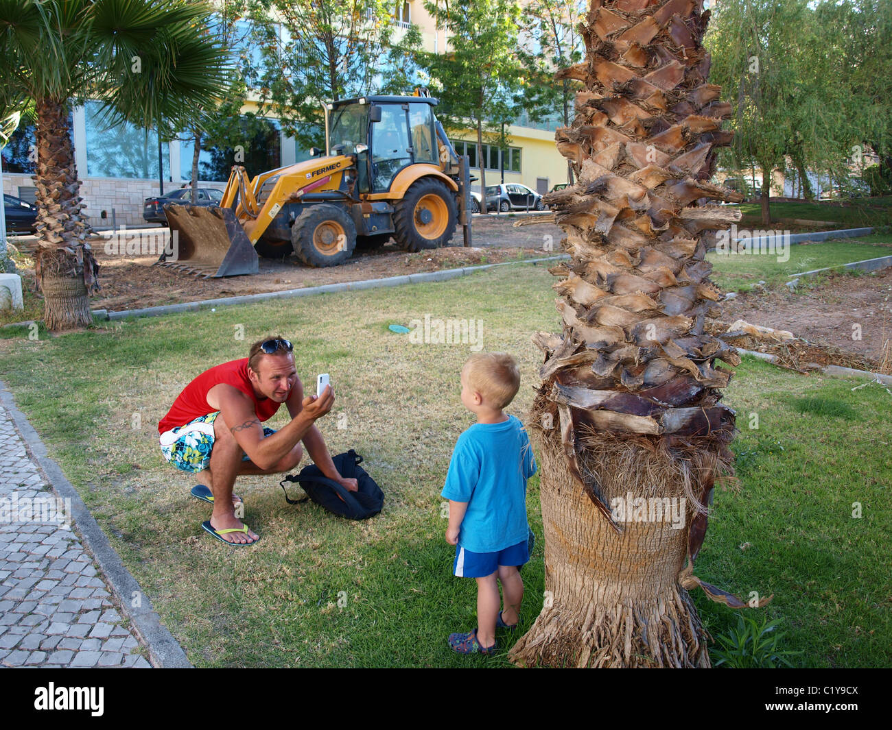 father making picture of his son Stock Photo - Alamy