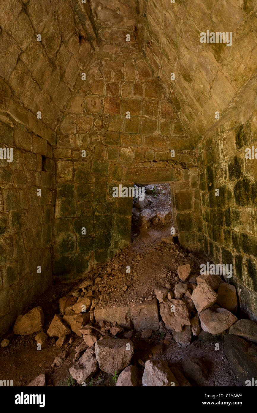 Interior room with corbel arch in El Palacio or The Palace at the Puuc ...