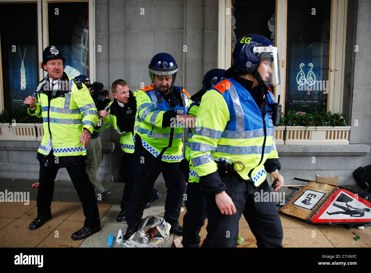 Riot police as anti capitalists attack The Ritz hotel in central London ...